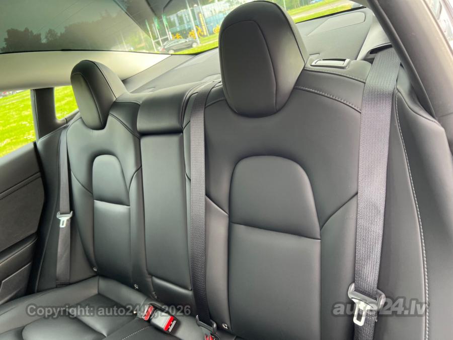 Black Tesla Model 3 2022 in Tallinn, with an engine capacity of 0.00 L and mileage of 144 thousand km for 30990 €, photo 26 on AUTOMOTO.COM.LV