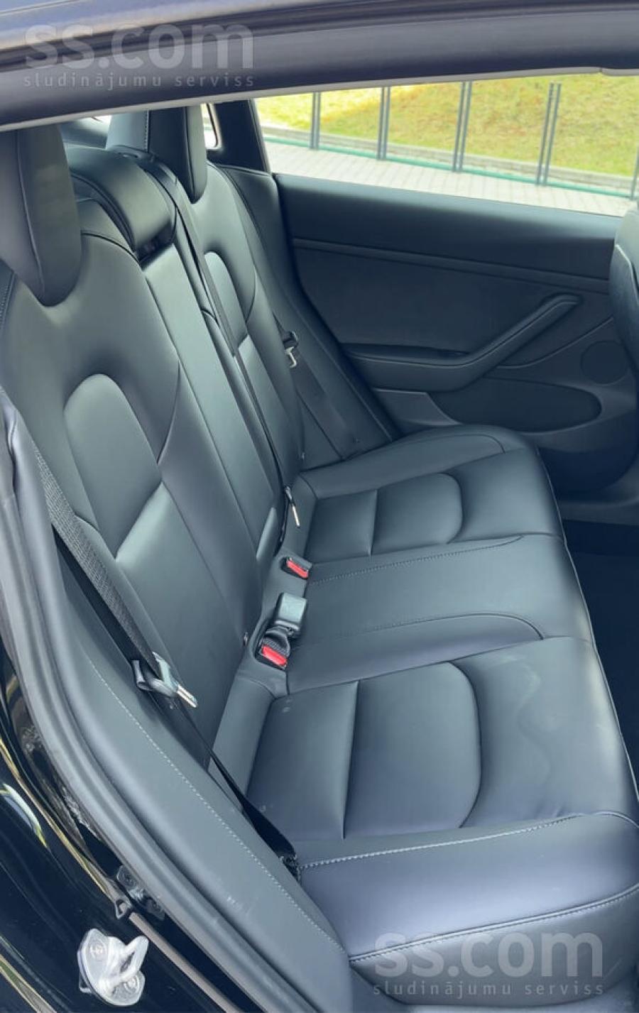 Black Tesla Model 3 2022 in Riga, with an engine capacity of 0.00 L and mileage of 62 thousand km for 31400 €, photo 5 on AUTOMOTO.COM.LV