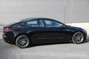 Black Tesla Model 3 2022 in Riga, with an engine capacity of 0.00 L and mileage of 39 thousand km for 34500 €, photo  on AUTOMOTO.COM.LV