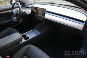 Black Tesla Model 3 2022 in Riga, with an engine capacity of 0.00 L and mileage of 39 thousand km for 34500 €, photo 5 on AUTOMOTO.COM.LV