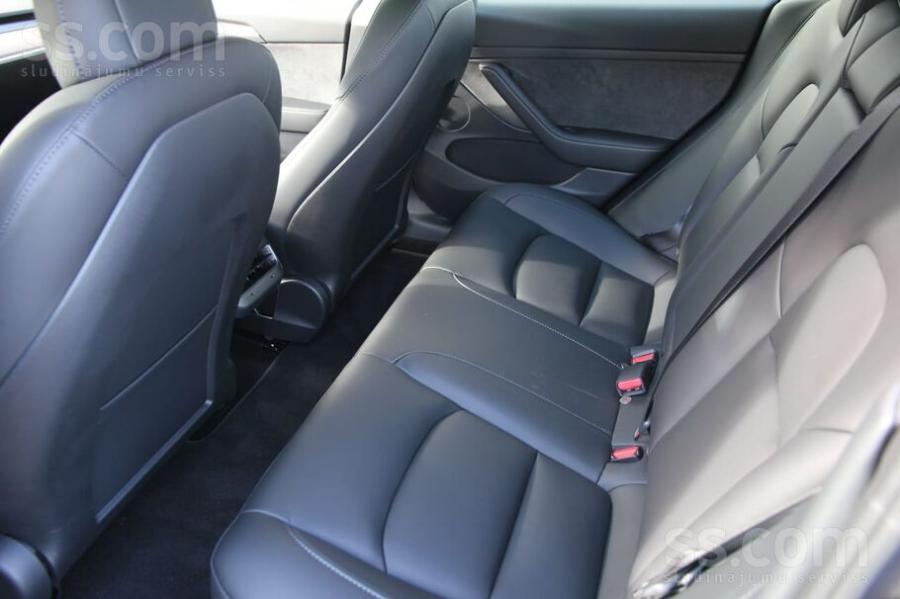 Black Tesla Model 3 2022 in Riga, with an engine capacity of 0.00 L and mileage of 39 thousand km for 34500 €, photo 7 on AUTOMOTO.COM.LV