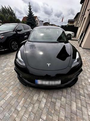 Black Tesla Model 3 2022 in Vilnius, with an engine capacity of 0.00 L and mileage of 61 thousand km for 27950 €, photo  on AUTOMOTO.COM.LV