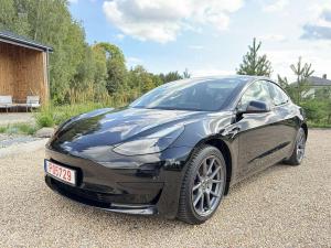 Black Tesla Model 3 2022 in Vilnius, with an engine capacity of 0.00 L and mileage of 199 thousand km for 22499 €, photo 7 on AUTOMOTO.COM.LV
