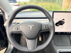 Black Tesla Model 3 2022 in Vilnius, with an engine capacity of 0.00 L and mileage of 199 thousand km for 22499 €, photo 11 on AUTOMOTO.COM.LV
