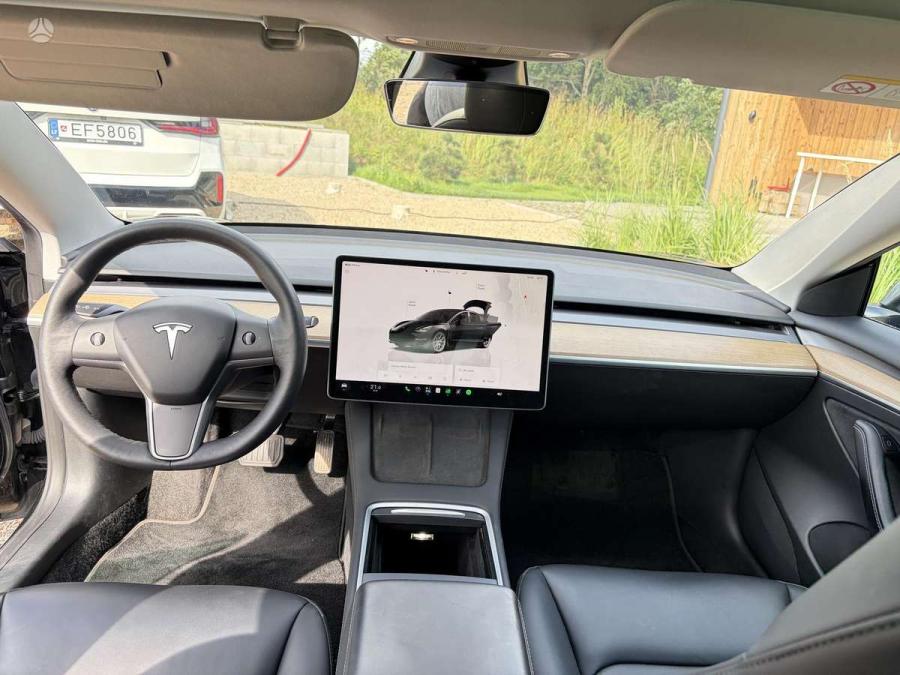 Black Tesla Model 3 2022 in Vilnius, with an engine capacity of 0.00 L and mileage of 199 thousand km for 22499 €, photo 17 on AUTOMOTO.COM.LV