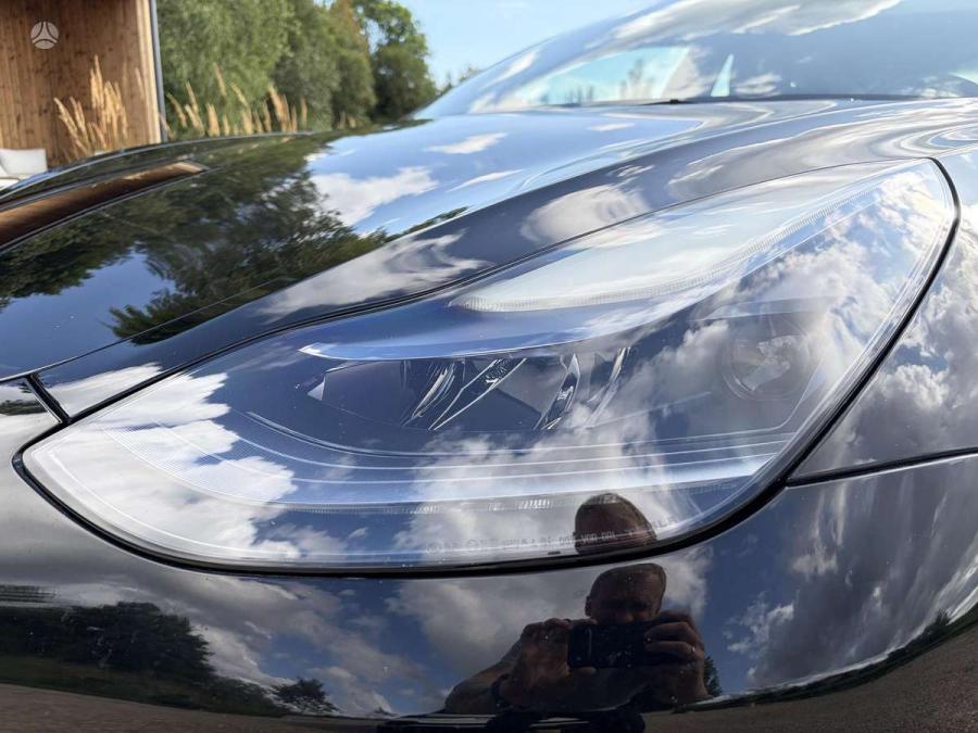 Black Tesla Model 3 2022 in Vilnius, with an engine capacity of 0.00 L and mileage of 199 thousand km for 22499 €, photo 19 on AUTOMOTO.COM.LV