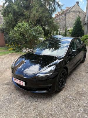 Black Tesla Model 3 2022 in Vilnius, with an engine capacity of 0.00 L and mileage of 64 thousand km for 23900 €, photo  on AUTOMOTO.COM.LV