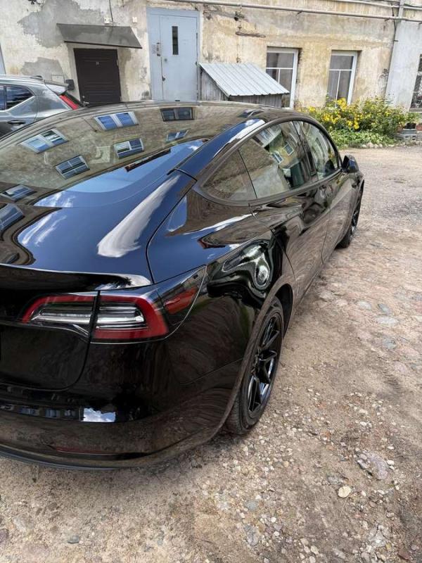 Black Tesla Model 3 2022 in Vilnius, with an engine capacity of 0.00 L and mileage of 64 thousand km for 23500 €, photo 6 on AUTOMOTO.COM.LV