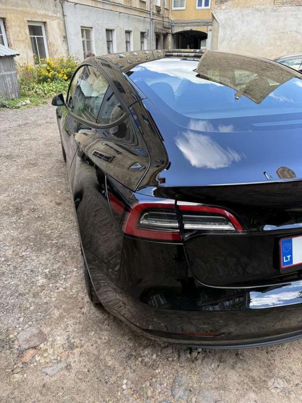 Black Tesla Model 3 2022 in Vilnius, with an engine capacity of 0.00 L and mileage of 64 thousand km for 23500 €, photo 7 on AUTOMOTO.COM.LV
