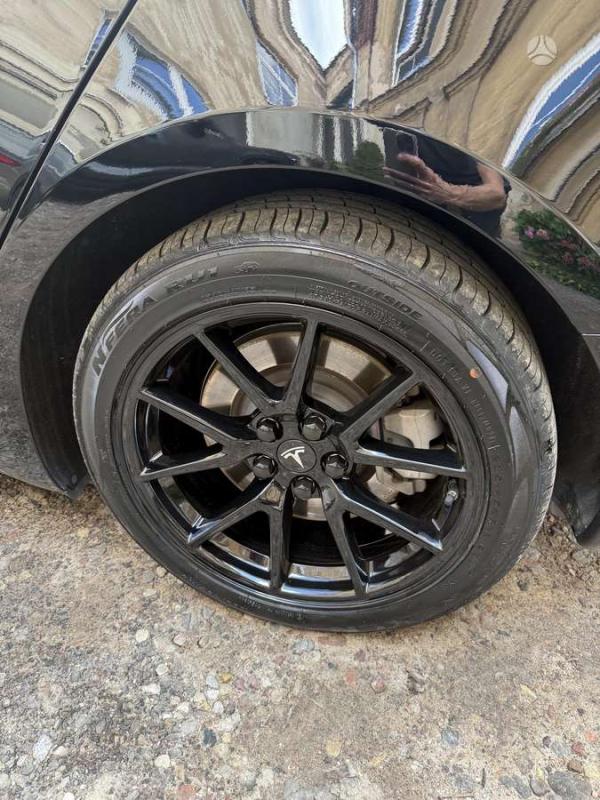Black Tesla Model 3 2022 in Vilnius, with an engine capacity of 0.00 L and mileage of 64 thousand km for 23500 €, photo 10 on AUTOMOTO.COM.LV
