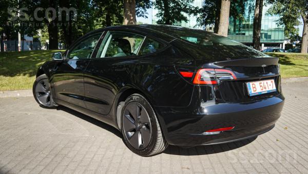 Black Tesla Model 3 2023 in Riga, with an engine capacity of 0.00 L and mileage of 108 thousand km for 26450 €, photo 8 on AUTOMOTO.COM.LV