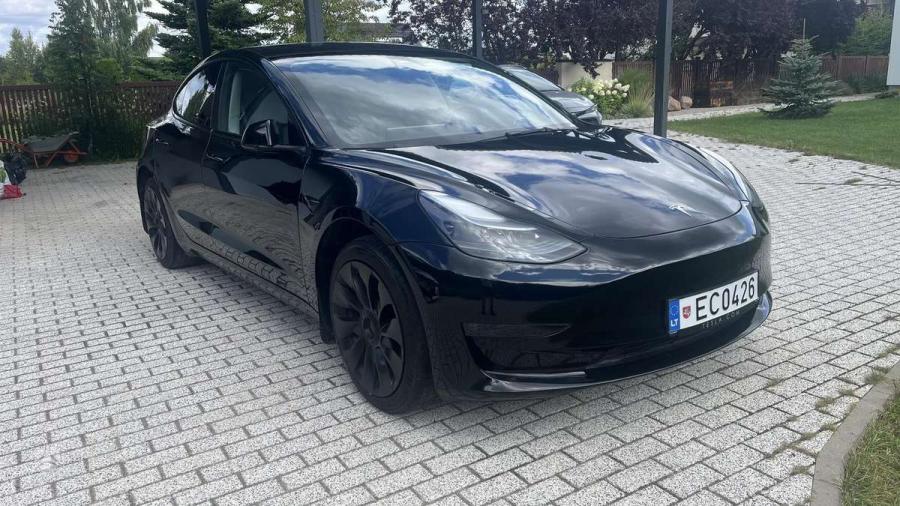 Black Tesla Model 3 2023 in Vilnius, with an engine capacity of 0.00 L and mileage of 50 thousand km for 23900 €, photo 1 on AUTOMOTO.COM.LV