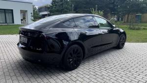 Black Tesla Model 3 2023 in Vilnius, with an engine capacity of 0.00 L and mileage of 50 thousand km for 23900 €, photo 6 on AUTOMOTO.COM.LV