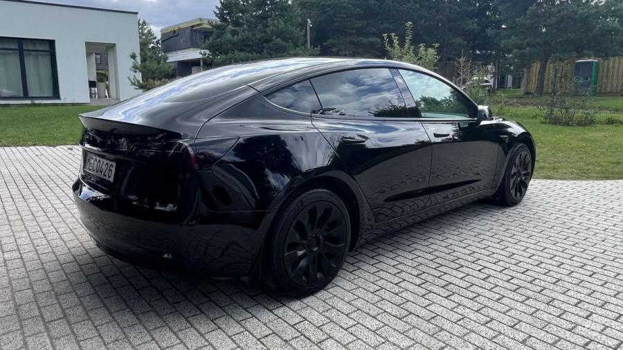 Black Tesla Model 3 2023 in Vilnius, with an engine capacity of 0.00 L and mileage of 50 thousand km for 23900 €, photo 6 on AUTOMOTO.COM.LV