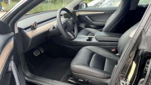 Black Tesla Model 3 2023 in Vilnius, with an engine capacity of 0.00 L and mileage of 50 thousand km for 23900 €, photo 7 on AUTOMOTO.COM.LV