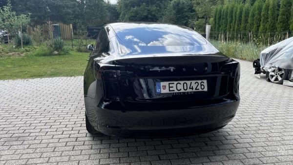 Black Tesla Model 3 2023 in Vilnius, with an engine capacity of 0.00 L and mileage of 50 thousand km for 23900 €, photo 7 on AUTOMOTO.COM.LV