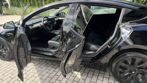 Black Tesla Model 3 2023 in Vilnius, with an engine capacity of 0.00 L and mileage of 50 thousand km for 23900 €, photo 9 on AUTOMOTO.COM.LV