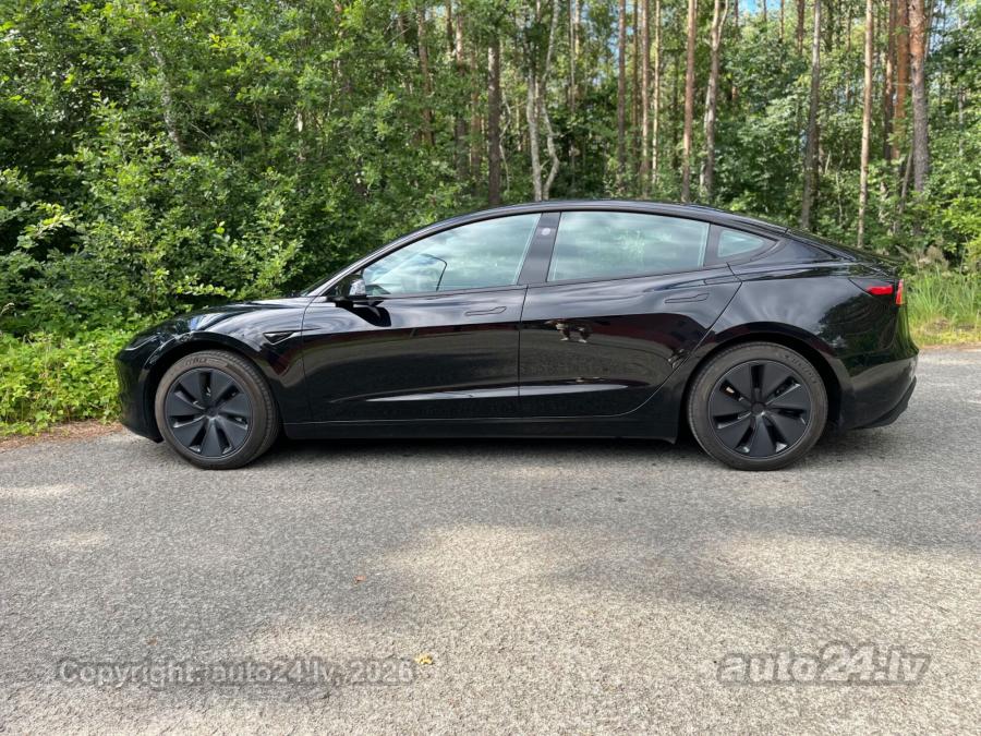 Black Tesla Model 3 2024 in Tallinn, with an engine capacity of 0.00 L and mileage of 70 thousand km for 36400 €, photo 6 on AUTOMOTO.COM.LV