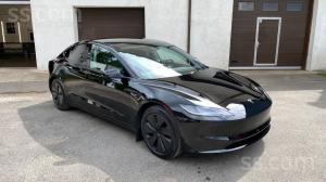 Black Tesla Model 3 2024 in Riga, with an engine capacity of 0.00 L and mileage of 21 thousand km for 41500 €, photo  on AUTOMOTO.COM.LV