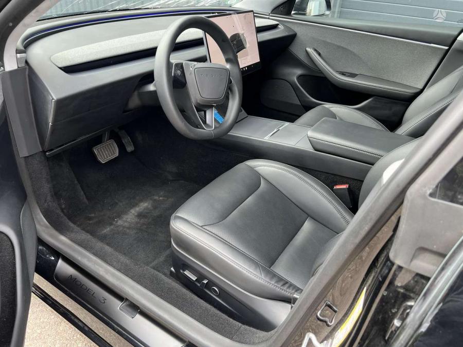 Black Tesla Model 3 2025 in Alytus, with an engine capacity of 0.00 L and mileage of 116 thousand km for 17950 €, photo 22 on AUTOMOTO.COM.LV
