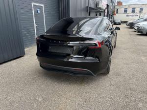 Black Tesla Model 3 2025 in Alytus, with an engine capacity of 0.00 L and mileage of 116 thousand km for 17800 €, photo 7 on AUTOMOTO.COM.LV