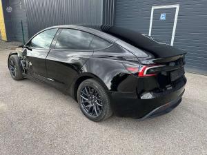 Black Tesla Model 3 2025 in Alytus, with an engine capacity of 0.00 L and mileage of 116 thousand km for 17800 €, photo 11 on AUTOMOTO.COM.LV
