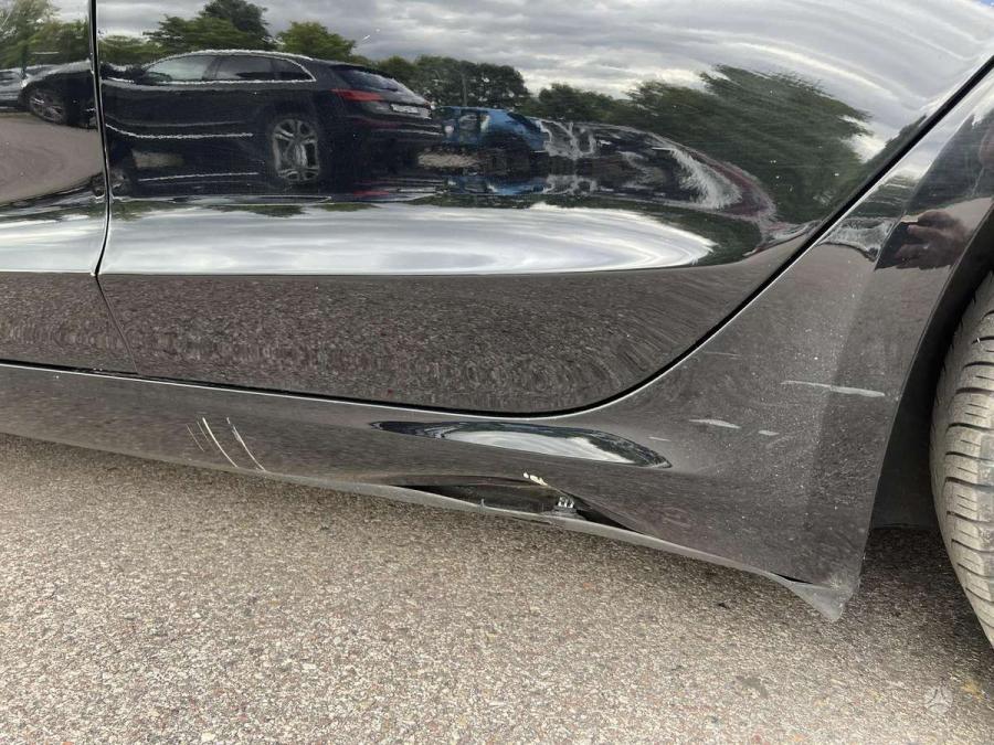 Black Tesla Model 3 2025 in Alytus, with an engine capacity of 0.00 L and mileage of 116 thousand km for 17800 €, photo 13 on AUTOMOTO.COM.LV