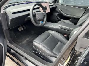 Black Tesla Model 3 2025 in Alytus, with an engine capacity of 0.00 L and mileage of 116 thousand km for 17800 €, photo 24 on AUTOMOTO.COM.LV