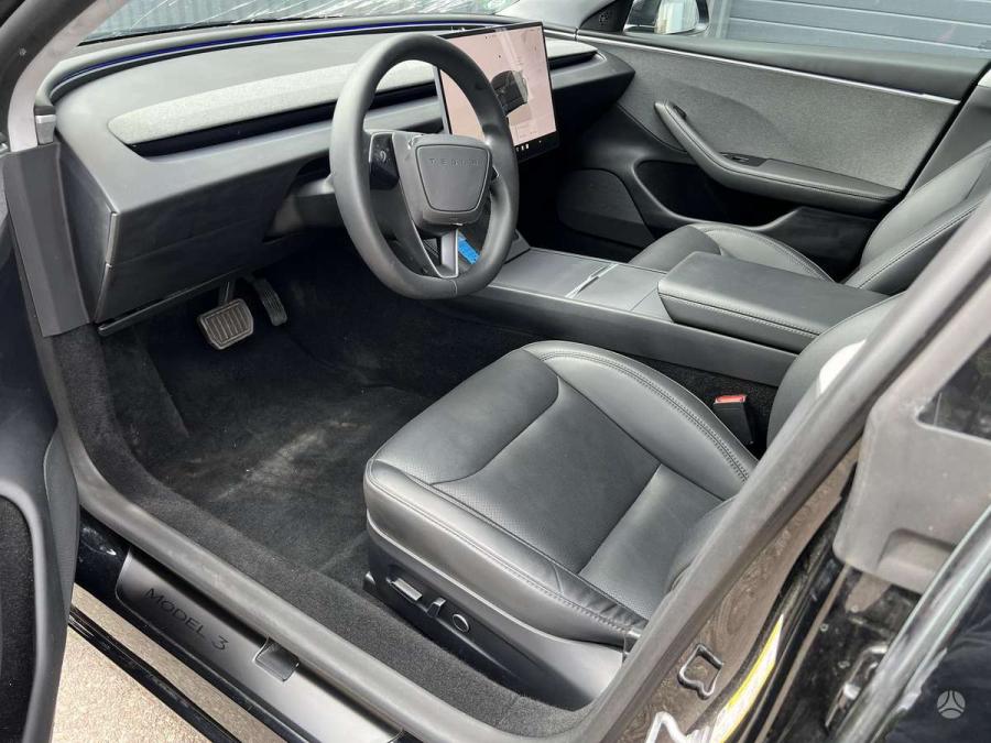 Black Tesla Model 3 2025 in Alytus, with an engine capacity of 0.00 L and mileage of 116 thousand km for 17800 €, photo 24 on AUTOMOTO.COM.LV
