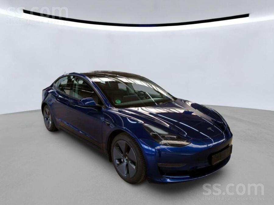 Blue Tesla Model 3 2021 in Riga, with an engine capacity of 0.00 L and mileage of 106 thousand km for 26990 €, photo 3 on AUTOMOTO.COM.LV