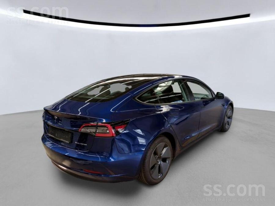 Blue Tesla Model 3 2021 in Riga, with an engine capacity of 0.00 L and mileage of 106 thousand km for 26990 €, photo 4 on AUTOMOTO.COM.LV