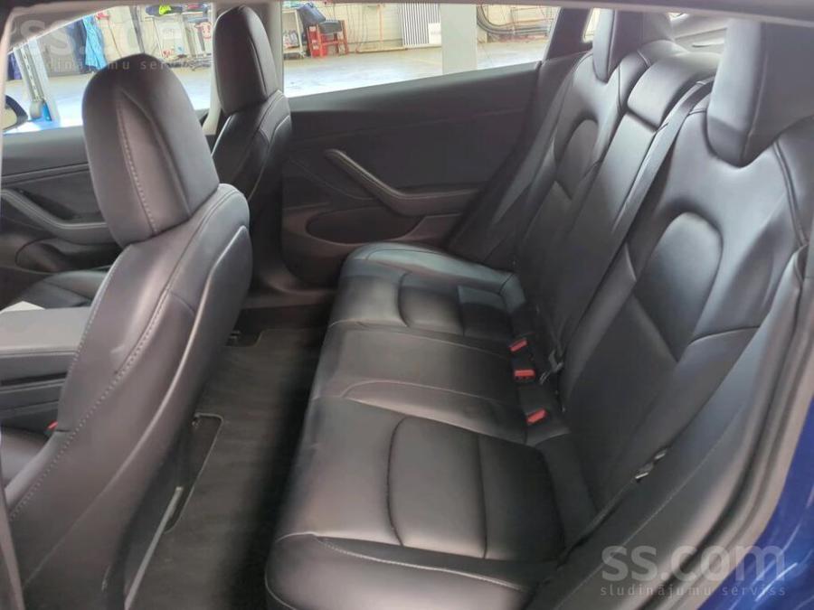 Blue Tesla Model 3 2021 in Riga, with an engine capacity of 0.00 L and mileage of 106 thousand km for 26990 €, photo 8 on AUTOMOTO.COM.LV