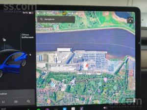 Blue Tesla Model 3 2021 in Riga, with an engine capacity of 0.00 L and mileage of 106 thousand km for 26990 €, photo 9 on AUTOMOTO.COM.LV