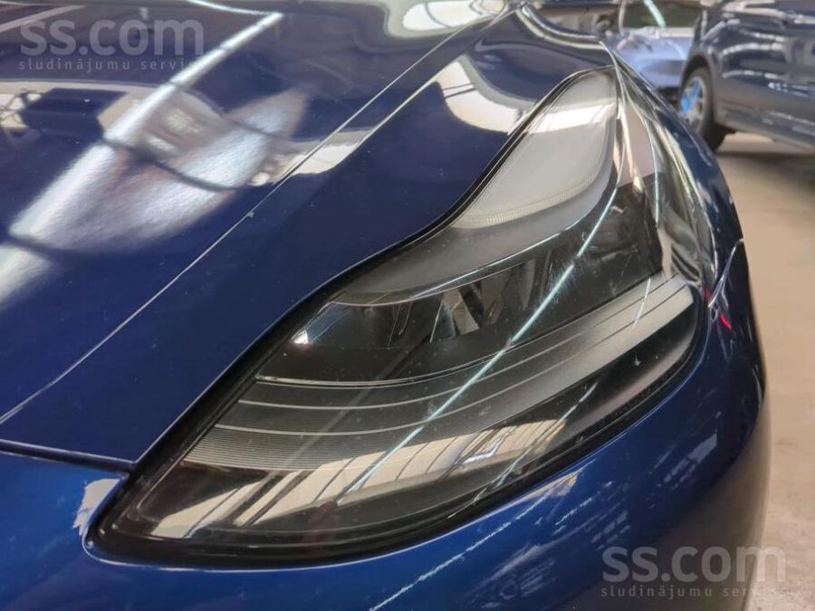 Blue Tesla Model 3 2021 in Riga, with an engine capacity of 0.00 L and mileage of 106 thousand km for 26990 €, photo 12 on AUTOMOTO.COM.LV