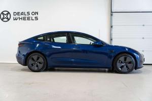 Blue Tesla Model 3 2021 in Vilnius, with an engine capacity of 0.00 L and mileage of 63 thousand km for 22500 €, photo 4 on AUTOMOTO.COM.LV