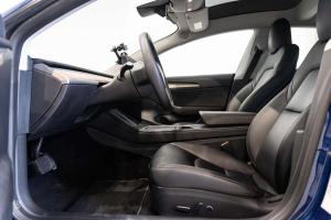 Blue Tesla Model 3 2021 in Vilnius, with an engine capacity of 0.00 L and mileage of 63 thousand km for 22500 €, photo 11 on AUTOMOTO.COM.LV