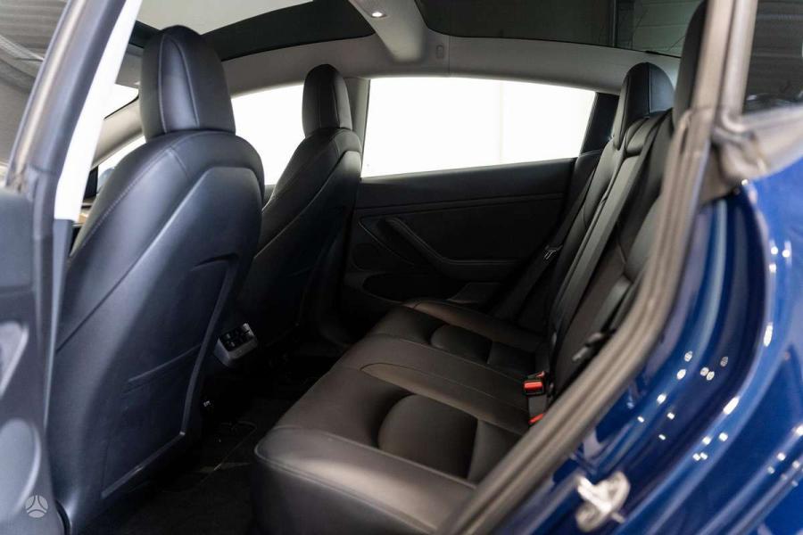 Blue Tesla Model 3 2021 in Vilnius, with an engine capacity of 0.00 L and mileage of 63 thousand km for 22500 €, photo 15 on AUTOMOTO.COM.LV