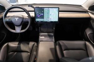 Blue Tesla Model 3 2021 in Vilnius, with an engine capacity of 0.00 L and mileage of 63 thousand km for 22500 €, photo 16 on AUTOMOTO.COM.LV