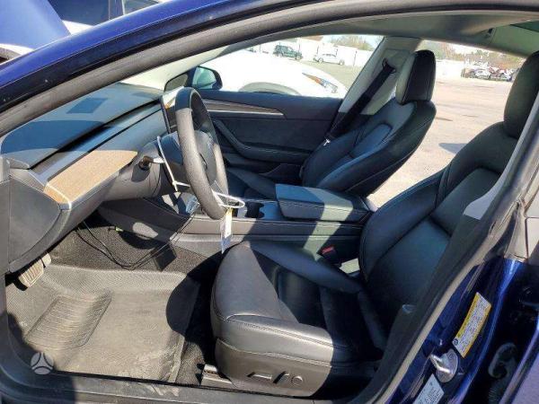 Blue Tesla Model 3 2023 in Vilnius, with an engine capacity of 0.00 L and mileage of 31 thousand km for 13950 €, photo 8 on AUTOMOTO.COM.LV
