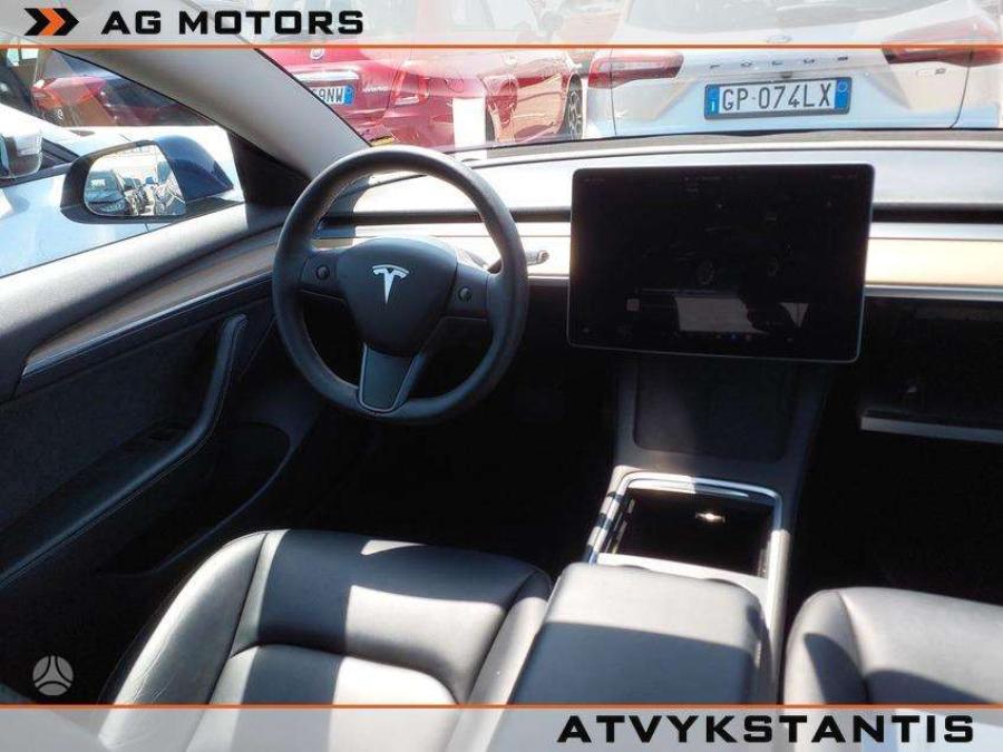 Blue Tesla Model 3 2023 in Vilnius, with an engine capacity of 0.00 L and mileage of 90 thousand km for 29900 €, photo 4 on AUTOMOTO.COM.LV
