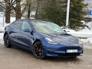 Blue Tesla Model 3 2019 in Riga, with an engine capacity of 0.00 L and mileage of 86 thousand km for 21950 €, photo 3 on AUTOMOTO.COM.LV