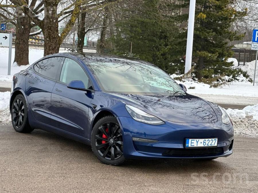 Blue Tesla Model 3 2019 in Riga, with an engine capacity of 0.00 L and mileage of 86 thousand km for 21950 €, photo 3 on AUTOMOTO.COM.LV