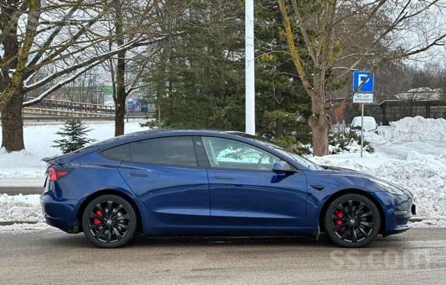 Blue Tesla Model 3 2019 in Riga, with an engine capacity of 0.00 L and mileage of 86 thousand km for 21950 €, photo 5 on AUTOMOTO.COM.LV