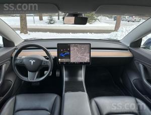 Blue Tesla Model 3 2019 in Riga, with an engine capacity of 0.00 L and mileage of 86 thousand km for 21950 €, photo 11 on AUTOMOTO.COM.LV