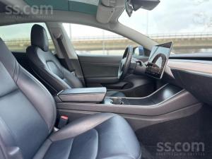 Blue Tesla Model 3 2019 in Riga, with an engine capacity of 0.00 L and mileage of 86 thousand km for 21950 €, photo 12 on AUTOMOTO.COM.LV