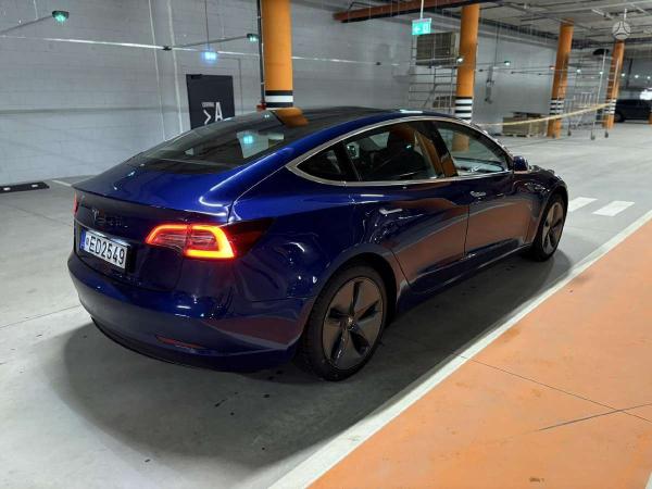 Blue Tesla Model 3 2019 in Vilnius, with an engine capacity of 0.00 L and mileage of 197 thousand km for 13850 €, photo 4 on AUTOMOTO.COM.LV