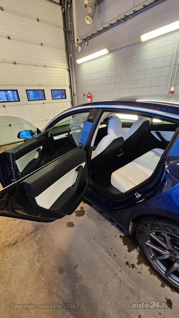 Blue Tesla Model 3 2019 in Tallinn, with an engine capacity of 0.00 L and mileage of 63 thousand km for 19000 €, photo 5 on AUTOMOTO.COM.LV