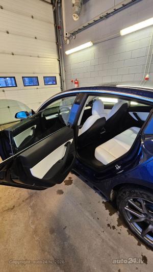 Blue Tesla Model 3 2019 in Tallinn, with an engine capacity of 0.00 L and mileage of 63 thousand km for 19000 €, photo 5 on AUTOMOTO.COM.LV