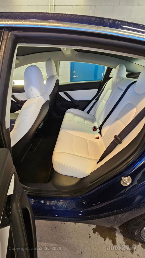 Blue Tesla Model 3 2019 in Tallinn, with an engine capacity of 0.00 L and mileage of 63 thousand km for 19000 €, photo 6 on AUTOMOTO.COM.LV