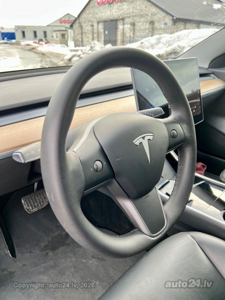 Blue Tesla Model 3 2020 in Tallinn, with an engine capacity of 0.00 L and mileage of 135 thousand km for 20499 €, photo 9 on AUTOMOTO.COM.LV